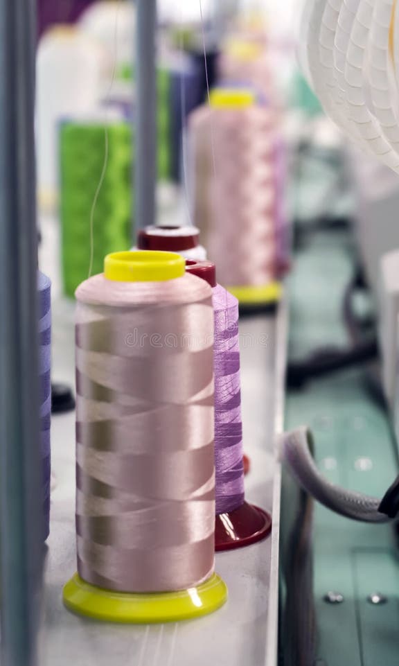 Colored Embroidery Thread on Cones on Embroidery Machine Stock Image ...