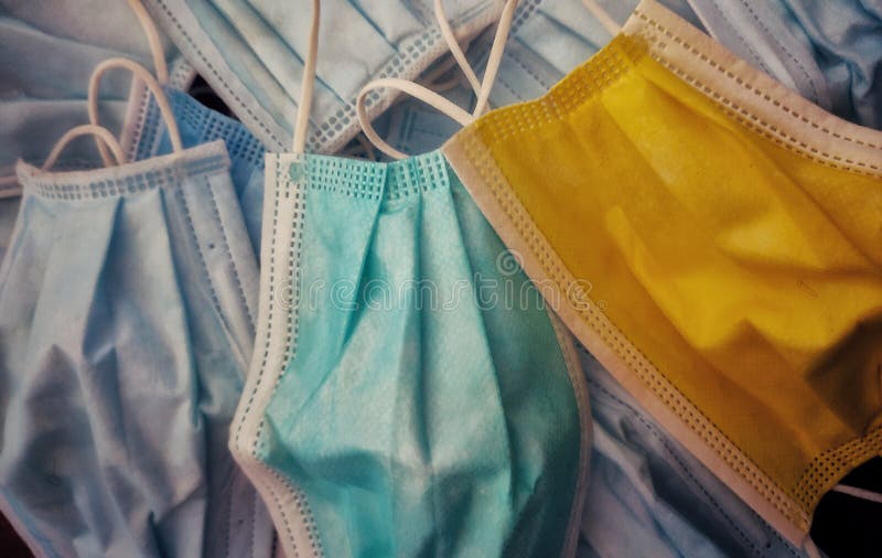 Colored Face Masks on the Ground Stock Image - Image of outerwear ...