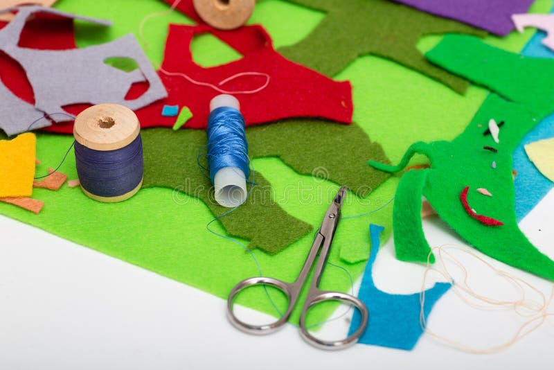 Colored Felt, Thread, Needles and Scissors on the Table Stock Photo ...
