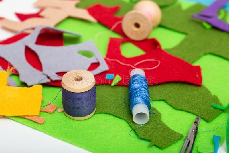 Colored Felt, Thread, Needles and Scissors on the Table Stock Image ...