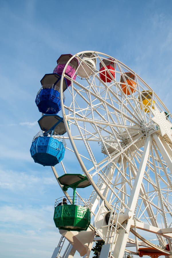 A colored ferris wheel stock photo. Image of circle, blue - 90730410