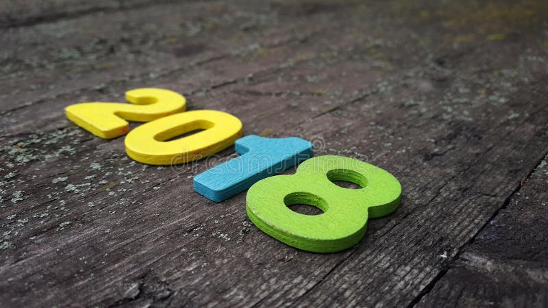 Colored Figures To Form the Number 2018 on Wooden Background Stock ...