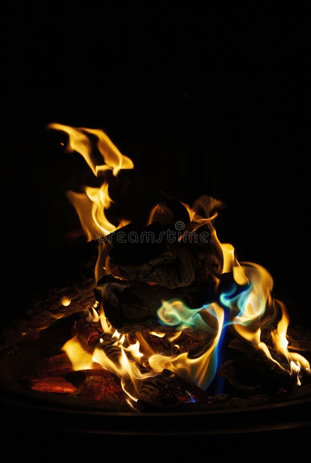 Colored Fire in a Cast Iron Outdoor Fireplace Stock Image - Image of ...