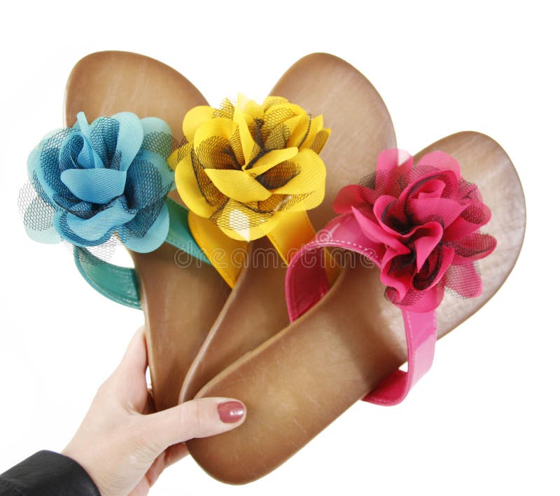 Colored Flip-flops with Flowers in Hand Stock Photo - Image of ...