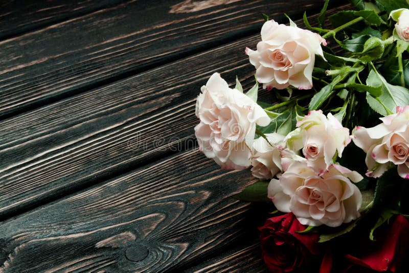 Colored Fresh Roses on Wood Desk. Stock Image - Image of roses ...