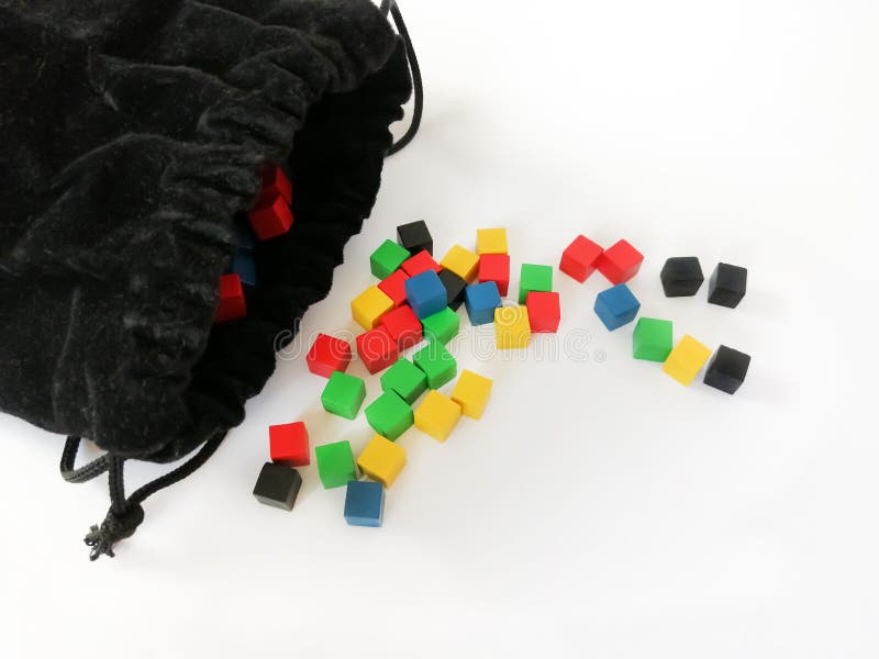 Colored, Game Cubes Next To a Black Storage Bag. Bright Cubes for ...