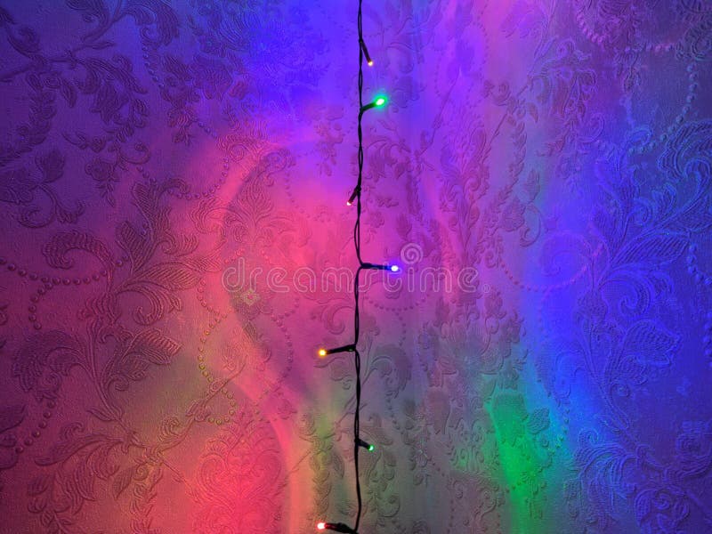 Colored Garland Shines in Different Colors and is Reflected from the ...