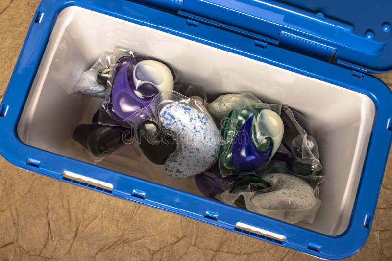 Colored Gel Capsules for Washing in a Plastic Container Close-up Stock ...