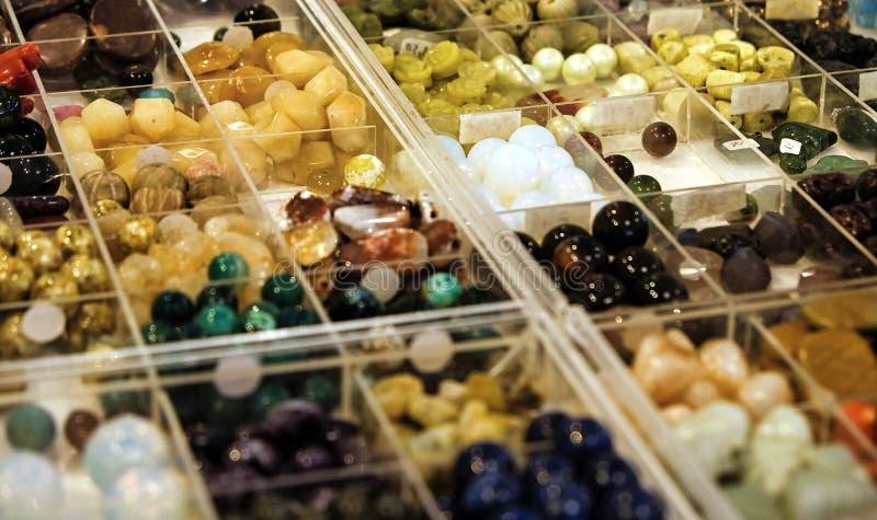 Colored gems on display stock image. Image of pattern - 137354495
