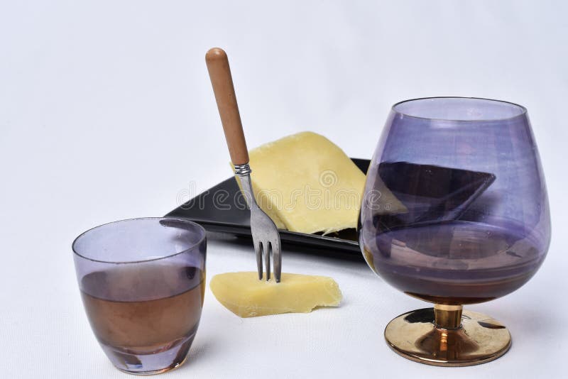 Colored Glass Goblet with Cognac and Cheese Stock Image - Image of ...