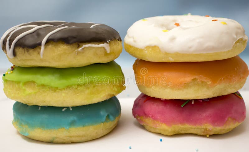 Colored glazed donuts stock photo. Image of dough, color - 106225504