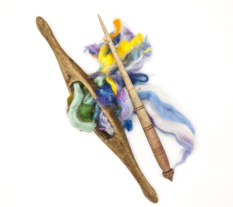Colored Hair and Old Spindle Close-up on White Background. Tools for ...