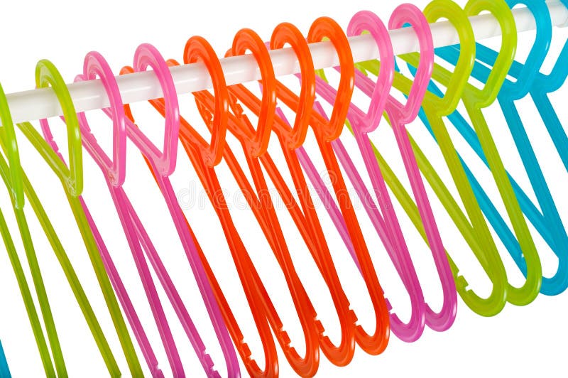Colored Hangers on a Rod in a Wardrobe Stock Image - Image of rack ...