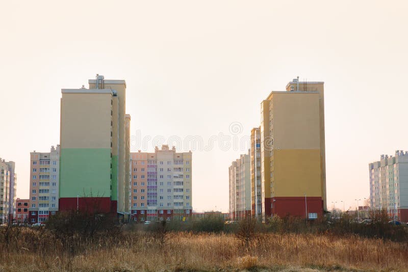 Colored High-rise Buildings at Sunset. Dormitory Area. New Buildings ...