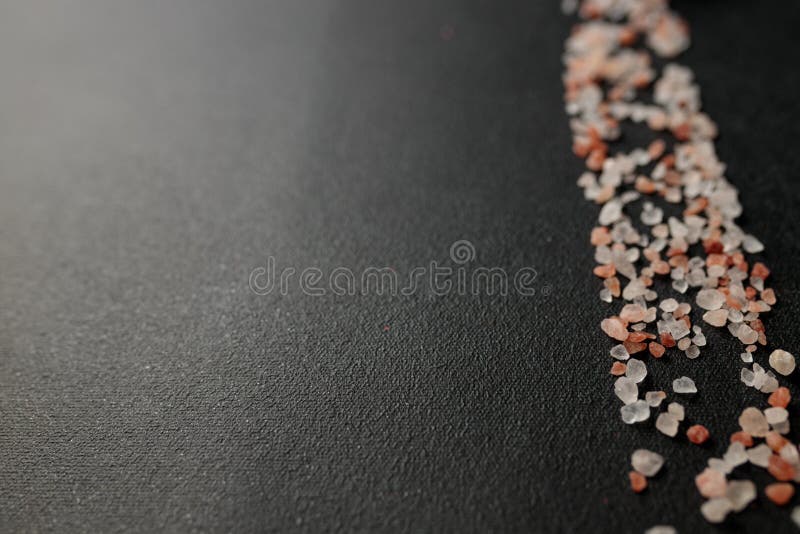 Colored Himalayan Salt on a Black Background. Straight Line Space for ...