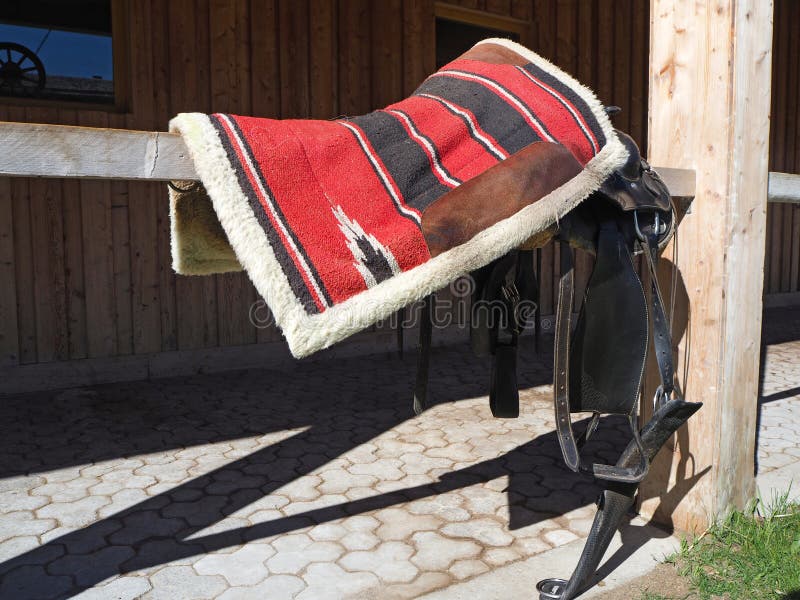 Colored Horse Saddle in a Farm Stock Photo - Image of domestic ...