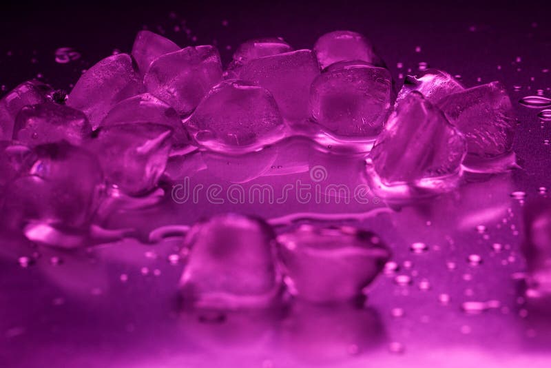Colored ice cubes closeup stock photo. Image of light - 191100562