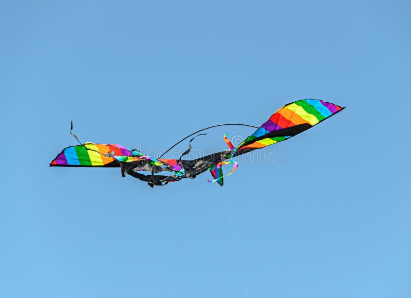Colored Kite Flying in the Blue Sky, Wings Close Up Stock Photo - Image ...