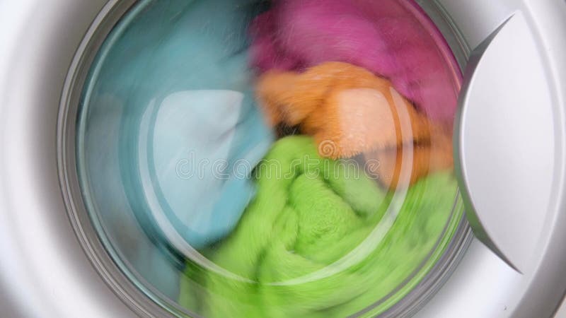 Colored Laundry is Washed in the Washing Machine Stock Footage - Video ...