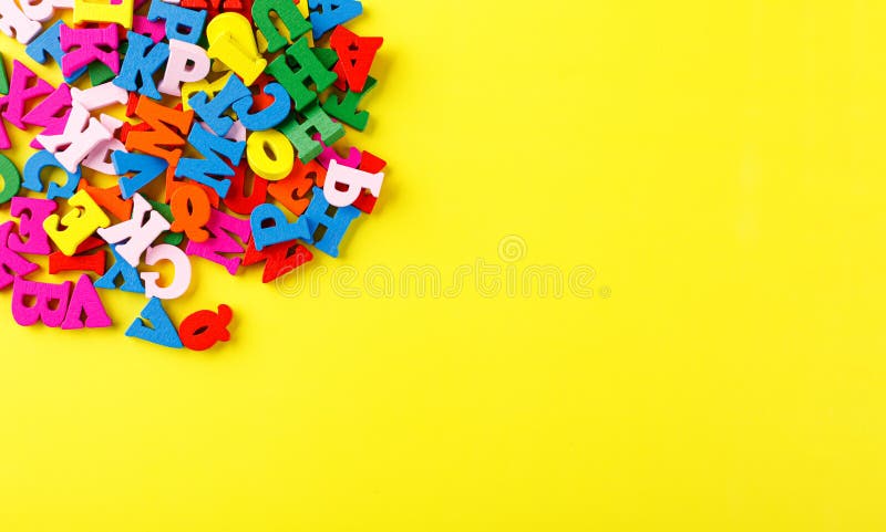 Colored Letters of the Alphabet on a Yellow Background Stock Image ...