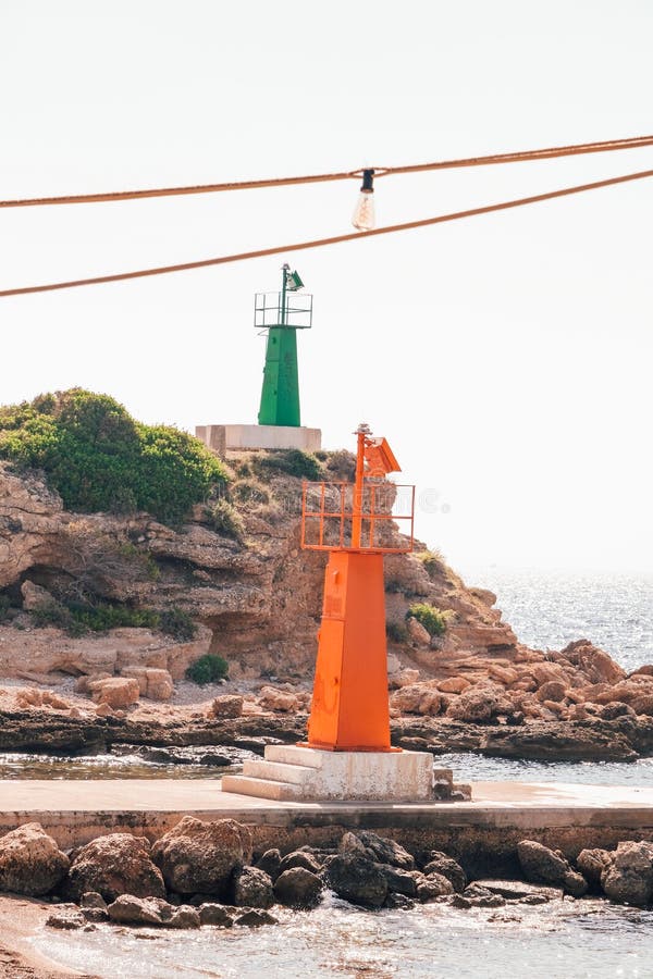 Colored Lighthouses in a Coastal Area of the Mediterranean Sea Stock ...