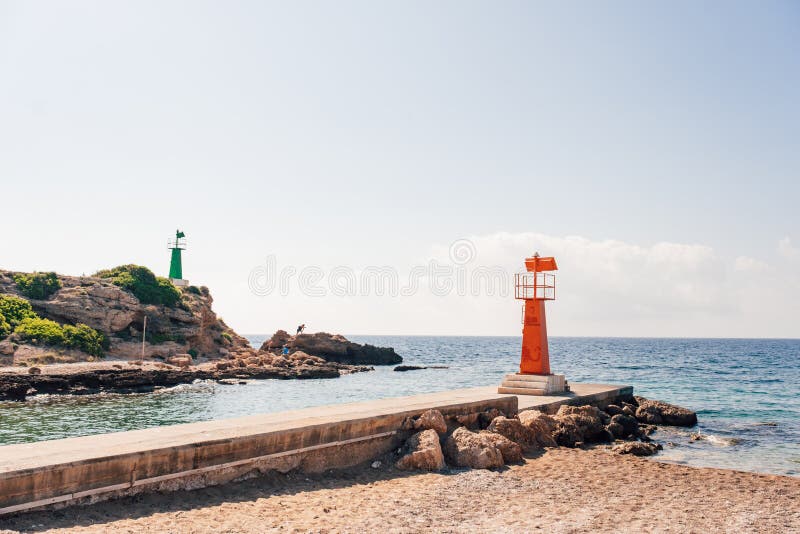 Colored Lighthouses in a Coastal Area of the Mediterranean Sea Stock ...