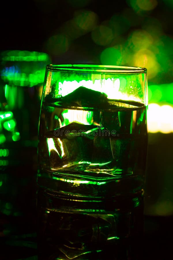 Colored Lighting of Glasses in the Night Club Bar Stock Photo - Image ...