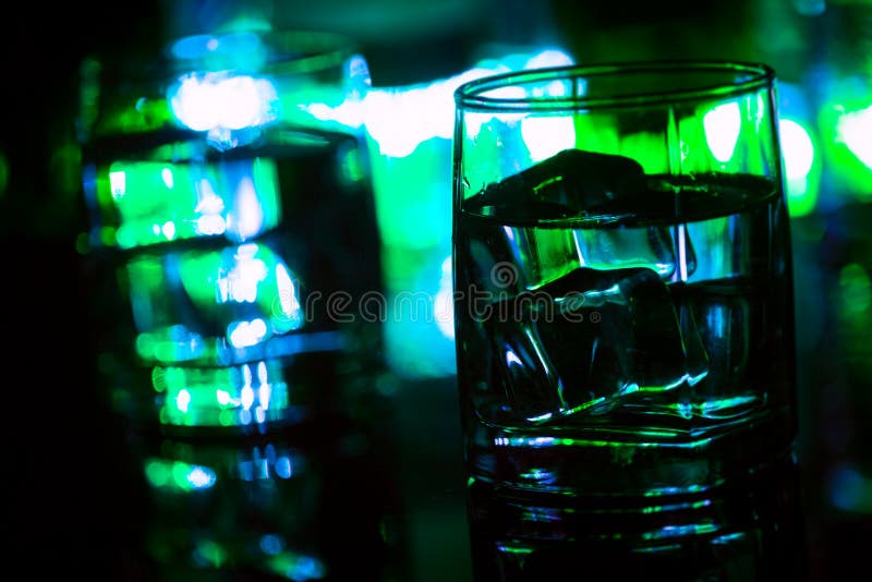 Colored Lighting of Glasses in the Night Club Bar Stock Photo - Image ...