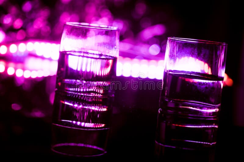 Colored Lighting of Glasses in the Night Club Bar Stock Image - Image ...