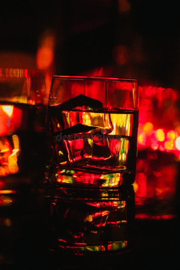 Colored Lighting of Glasses in the Night Club Bar Stock Image - Image ...