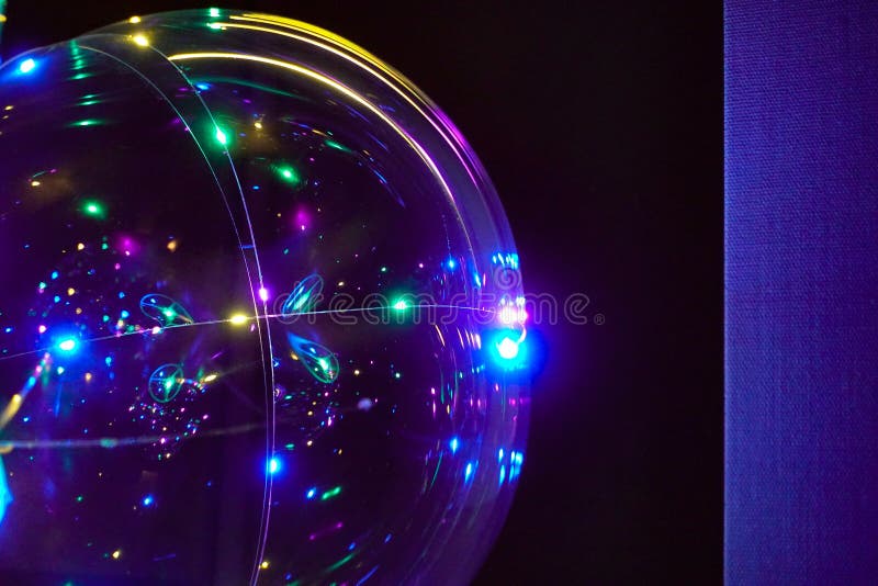 Colored Lights in the Form of a Sphere on a Dark Background. Abstract ...