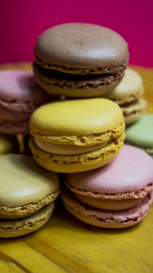 Colored Macarons Isolated on Wooden Dish, Typical French Dish Stock ...