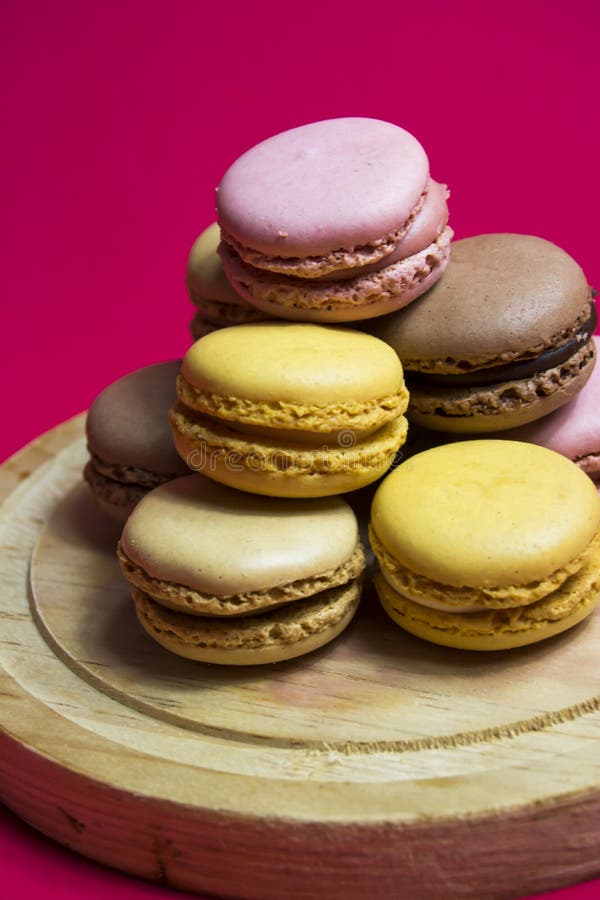 Colored Macarons Isolated on Wooden Dish, Typical French Dish Stock ...