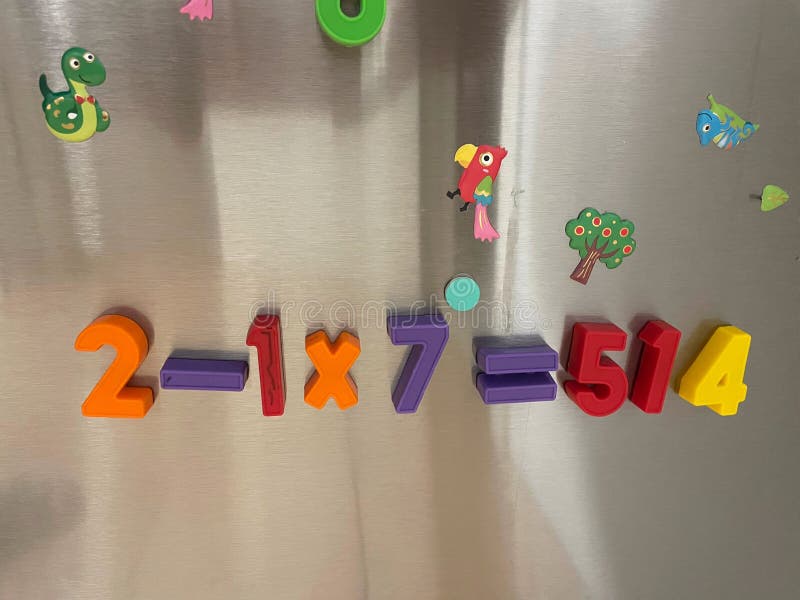 Colored Magnetic Numbers and Mathematical Symbols on a Refrigerator ... Colored Magnetic Numbers and Mathematical Symbols on a Refrigerator ...