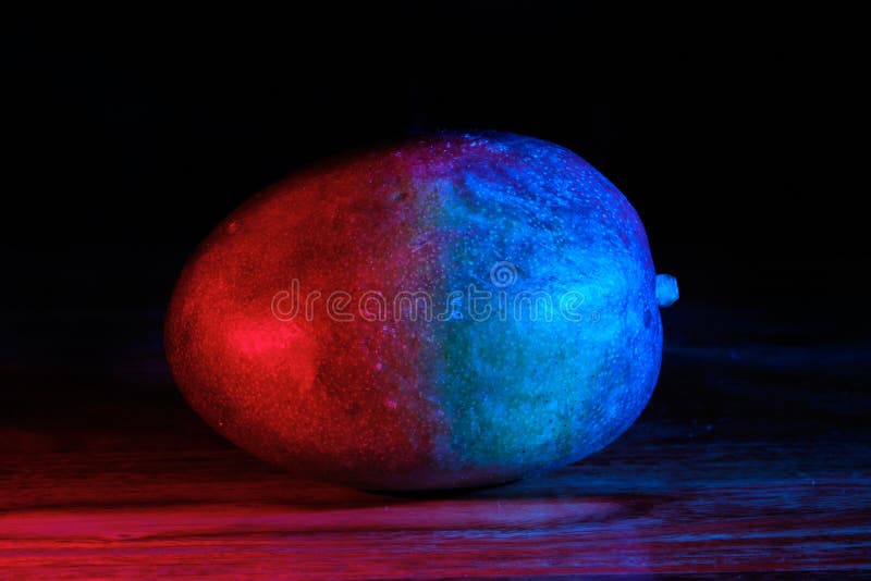 Colored Mango Fruit on Black Background Stock Image - Image of closeup ...