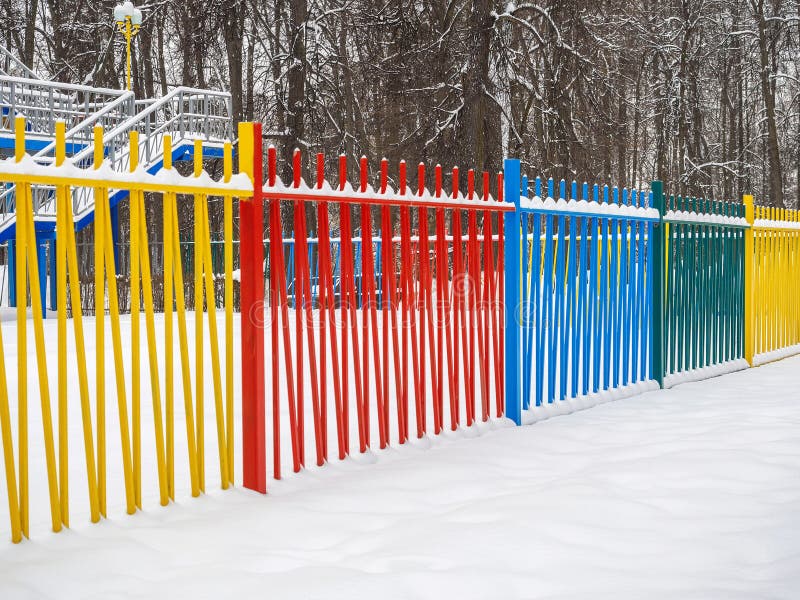 Colored Metal Fence in a Park Stock Image - Image of season, area: 85610083