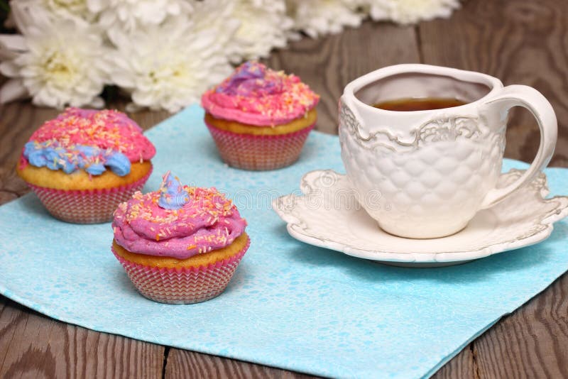Colored muffins with tea stock image. Image of coffee - 40332567