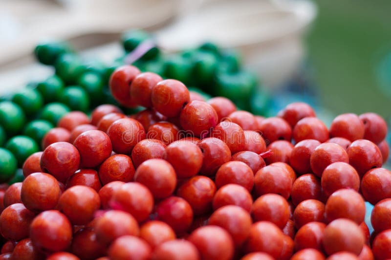Colored Necklace of Red Beads Strung on a Thread Stock Photo - Image of ...