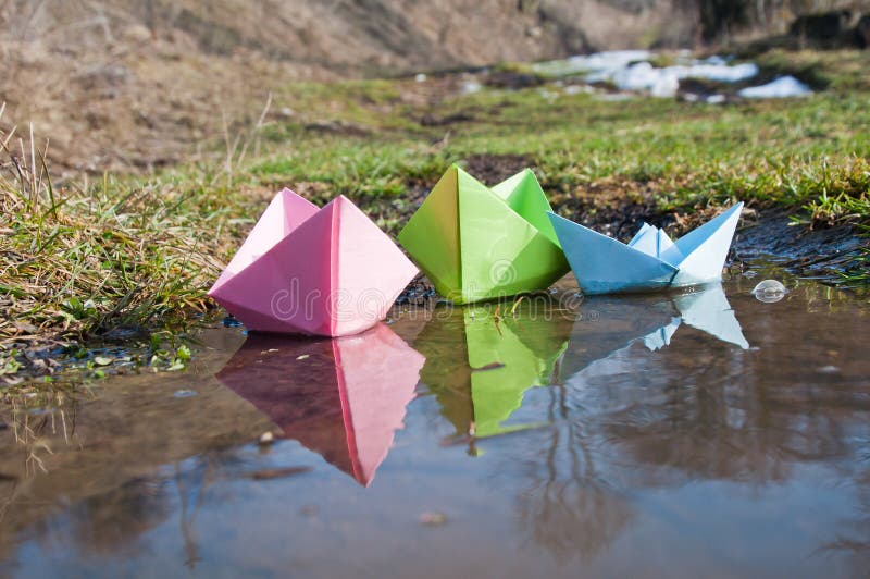 Colored Paper Boats Float in the Early Spring Puddles Stock Image ...