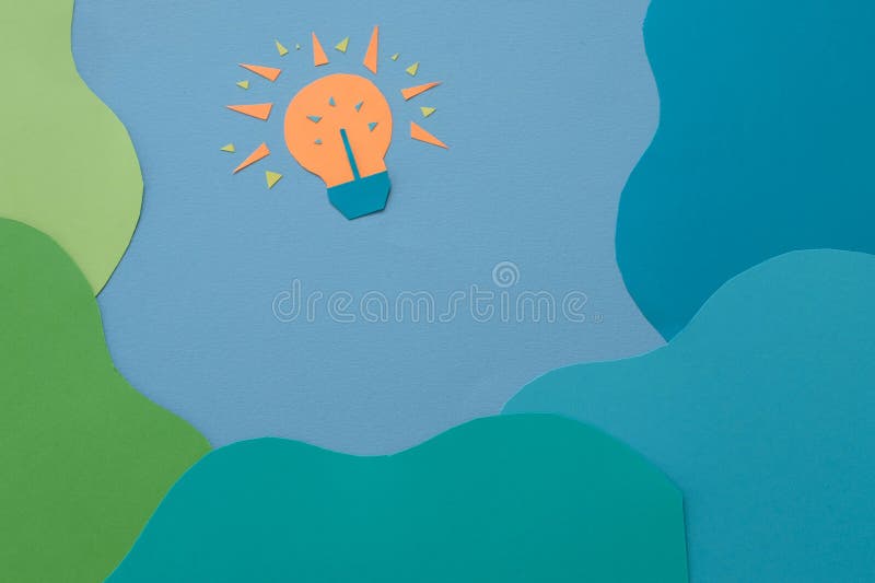 Colored Paper Cut To Resemble Light Bulb and Clouds in Sky Stock Image ...
