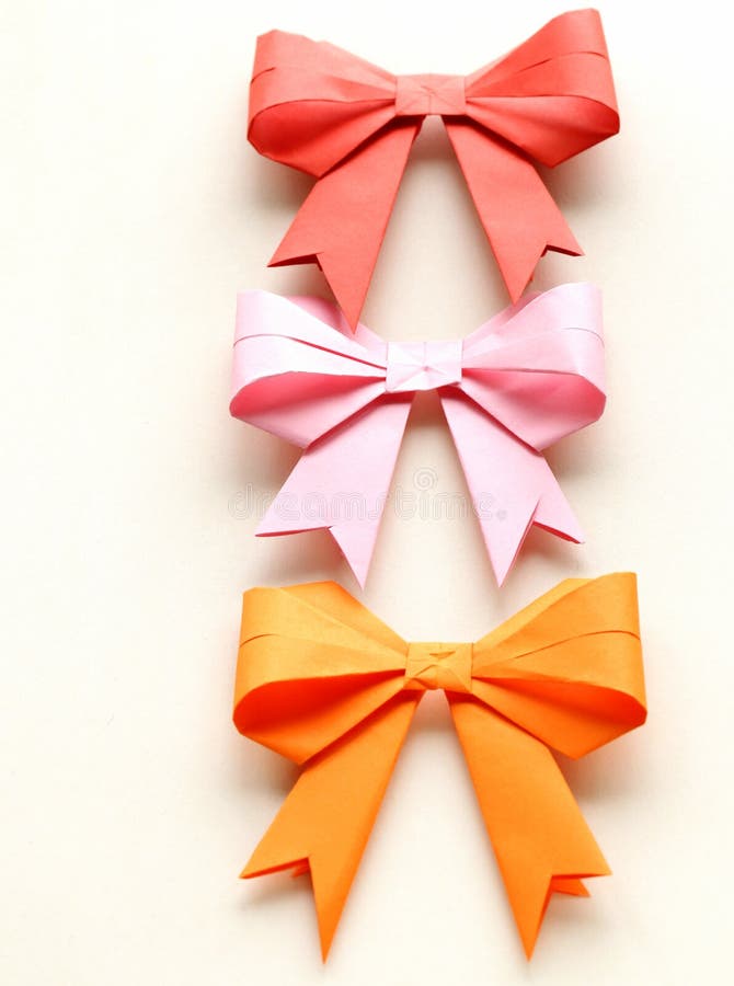 Colored Paper Origami Bows for Holiday Stock Photo - Image of pink ...