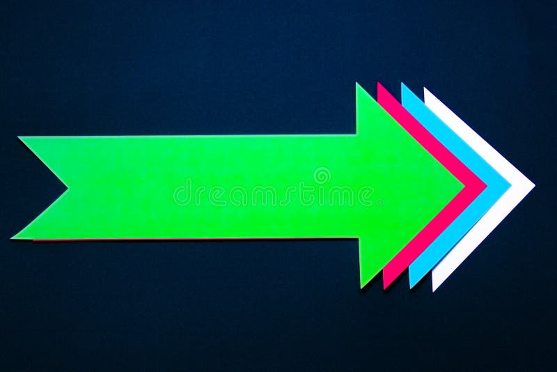 Colored Paper Right Arrow On Dark Blue Background. Stock Image - Image ...