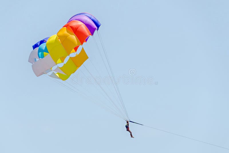 Colored Parasail Wing in the Blue Sky, Parasailing Also Known As ...