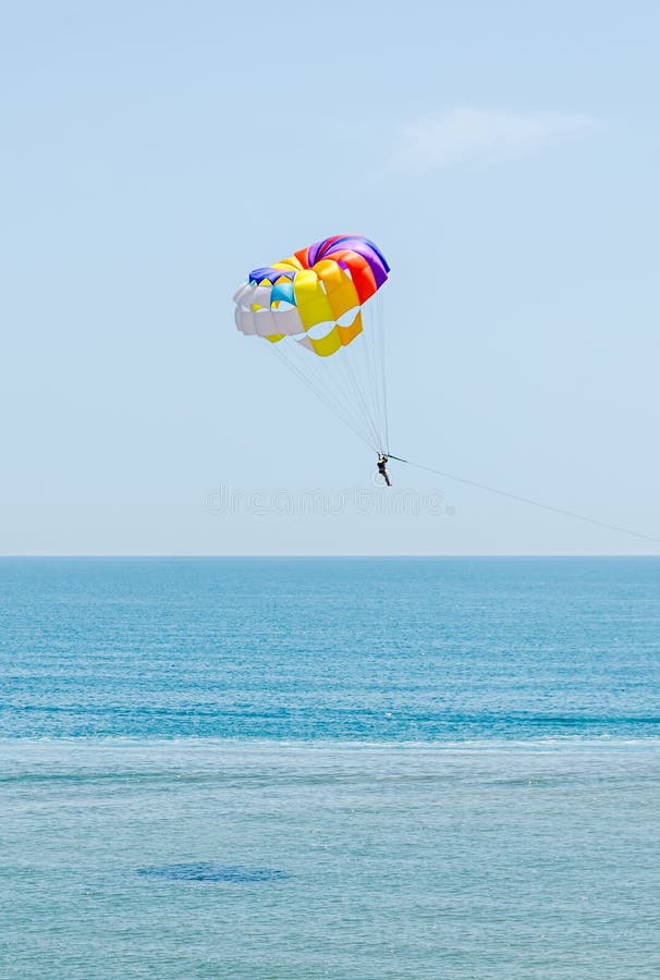 Colored Parasail Wing in the Blue Sky, Parasailing Also Known As ...