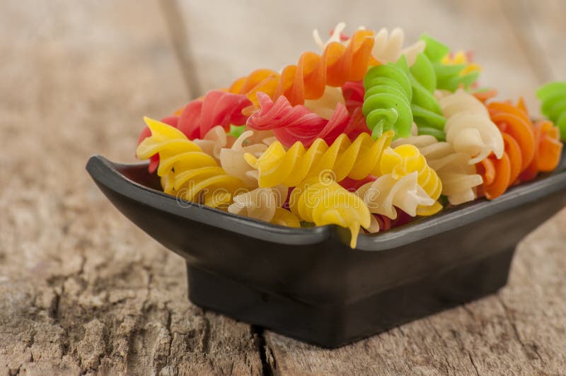 Colored pasta closeup stock image. Image of meal, green - 67136175
