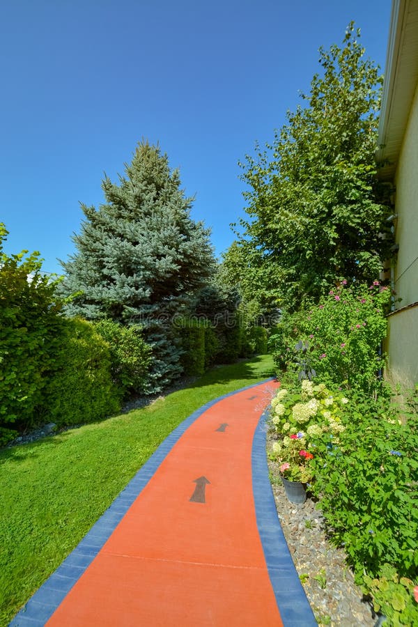 Colored Pathway Around a House with Arrows Pointing the Direction ...
