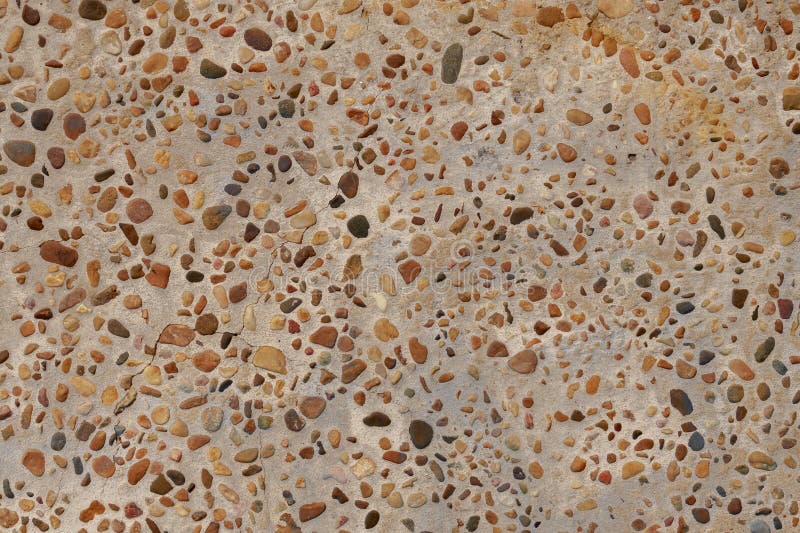 Colored Pebble Stone Wall of the Building Exterior Stock Photo - Image ...