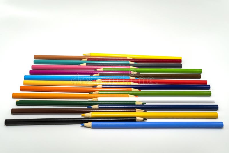 Colored Pencils Aligned on White Surface Stock Photo - Image of ...