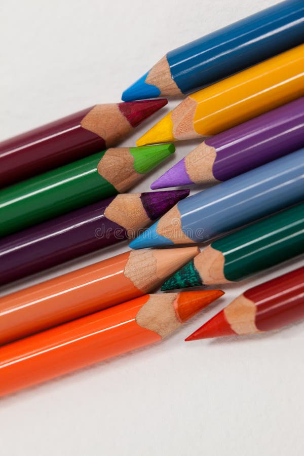 Colored Pencils Arranged in Interlock Pattern on White Background Stock ...