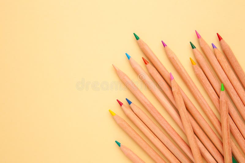 Colored Pencils on Beige Background with Copy Space. Top View Stock ...